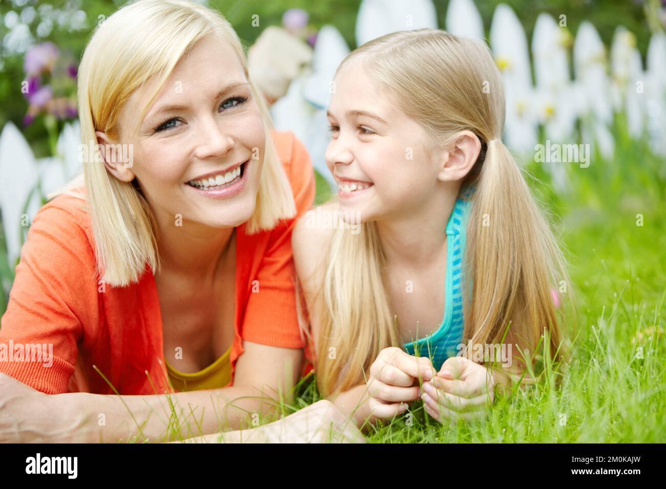 Spending time outdoors with mom. Cute little girl spending time with ...