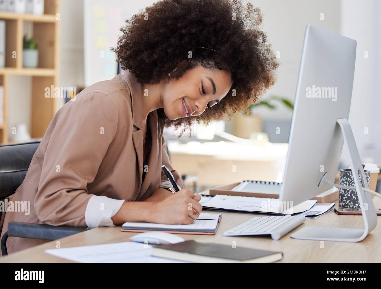 Smiling hispanic businesswoman sitting hi-res stock photography and ...