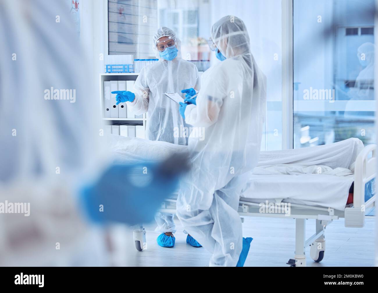 Doctors collecting a dead body. Team of csi specialists talking about ...