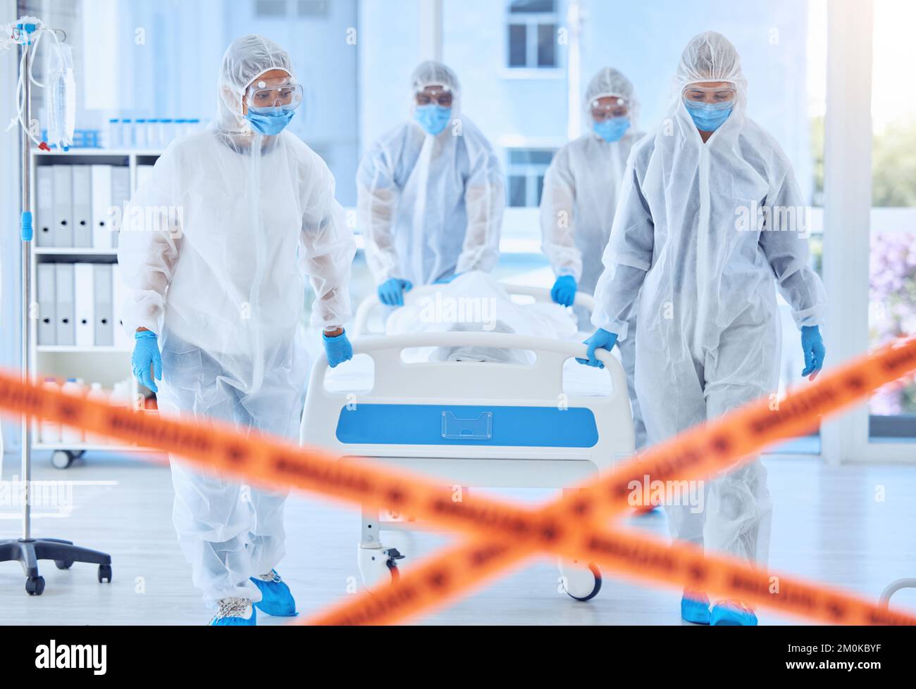 Csi team moving a bed with a dead body. Team of medical specialists ...