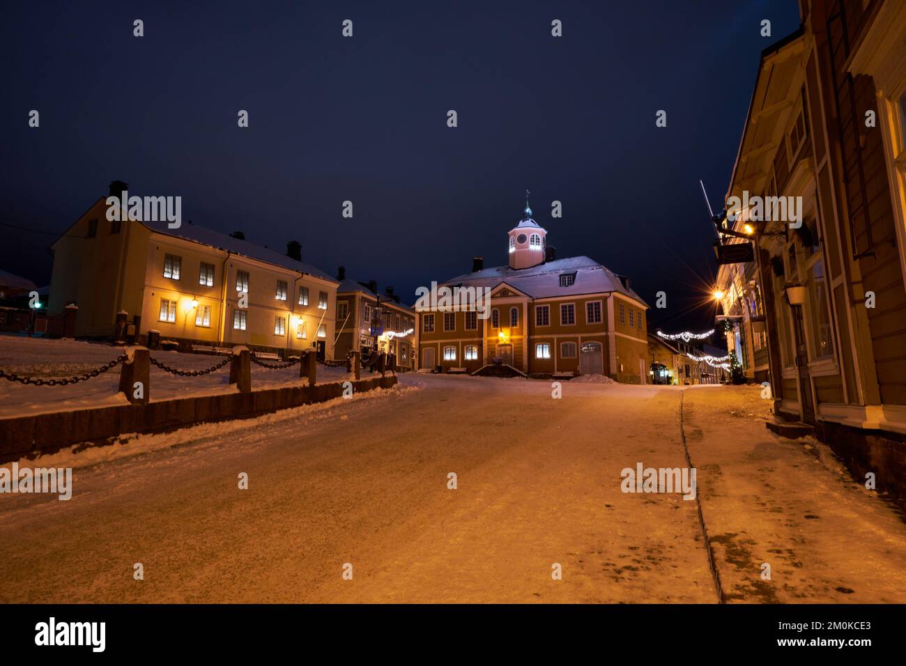 The Old Town Hall Museum in a snowy street at night in Porvoo, Finland ...