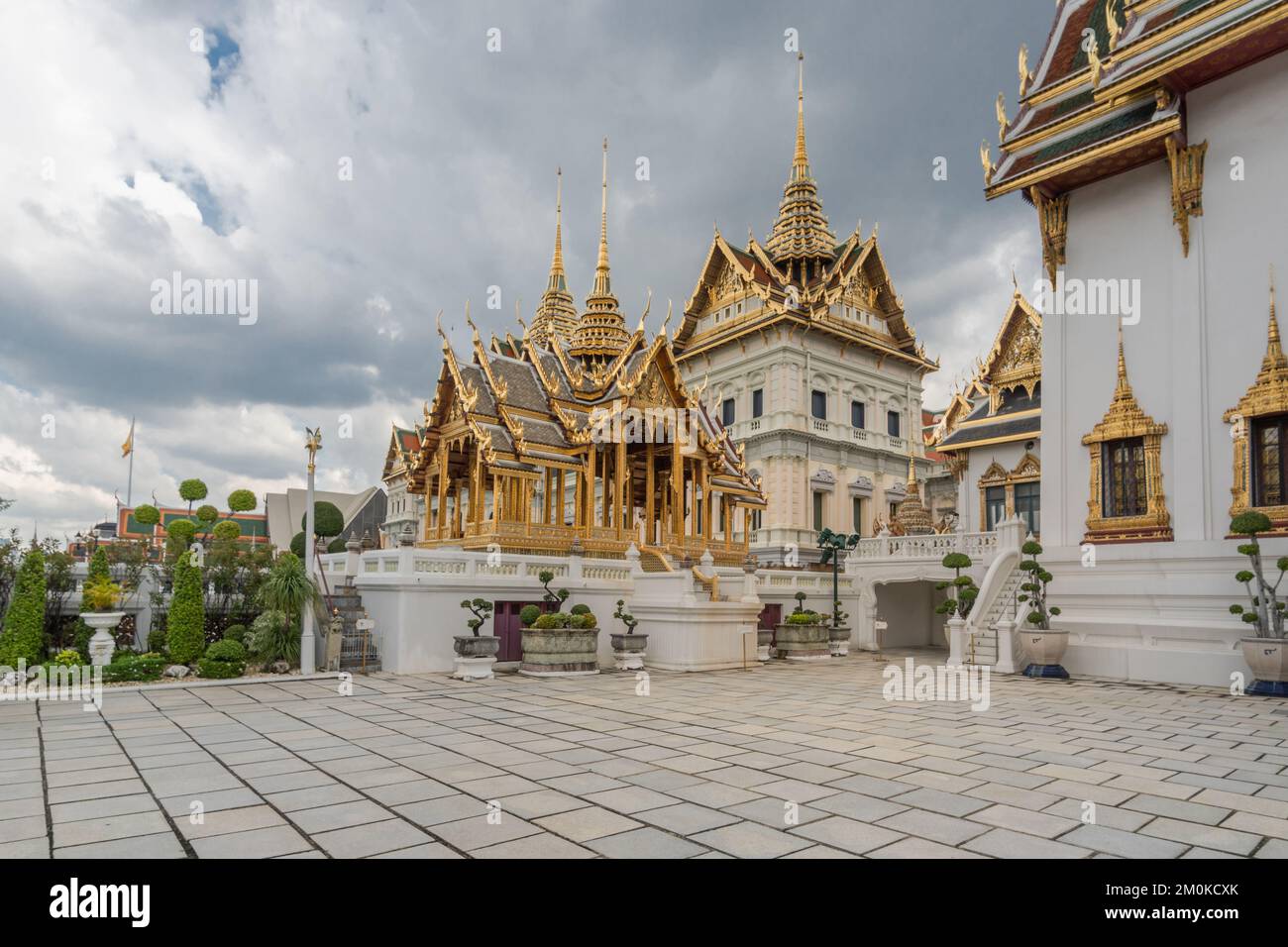 The Golden Palace of Kings (Grand Palace) under overcast sky in Bangkok ...