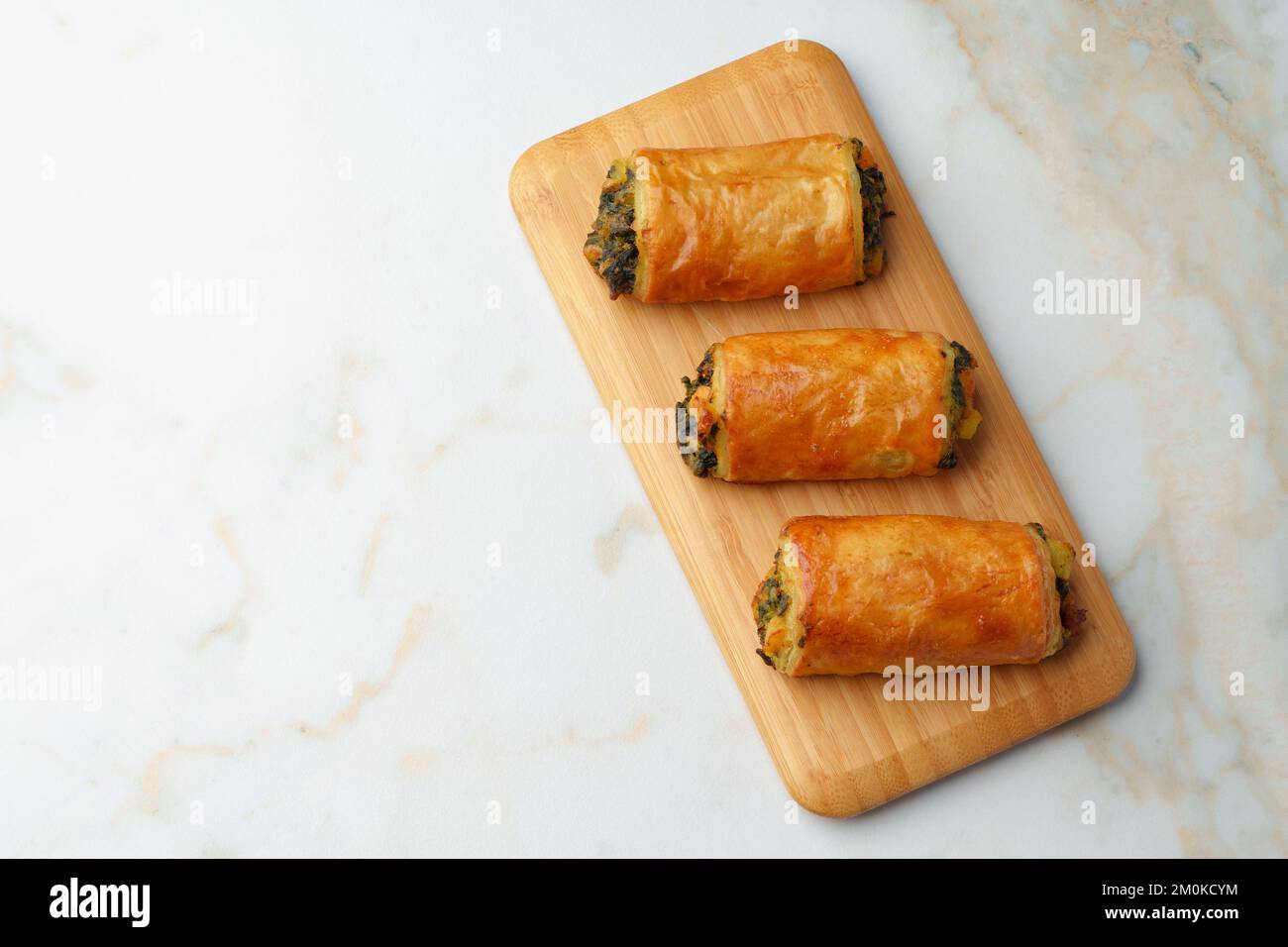 Banquet table with variety of stuffed pies pastry Stock Photo - Alamy