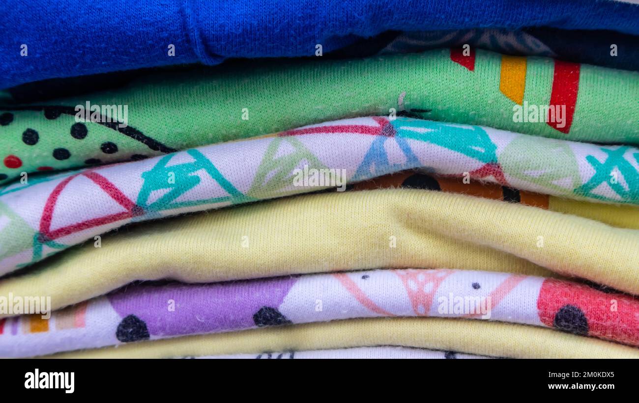 pile of clothes as background Stock Photo - Alamy
