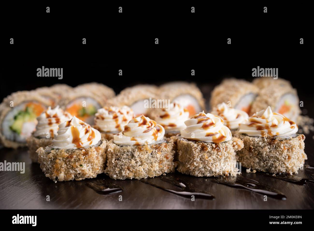 Set hot sushi rolls fried decorated cream cheese. Assortment of ...