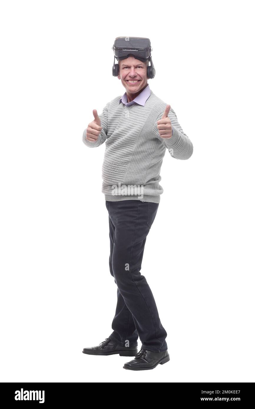 in full growth. smiling man in virtual reality glasses Stock Photo - Alamy