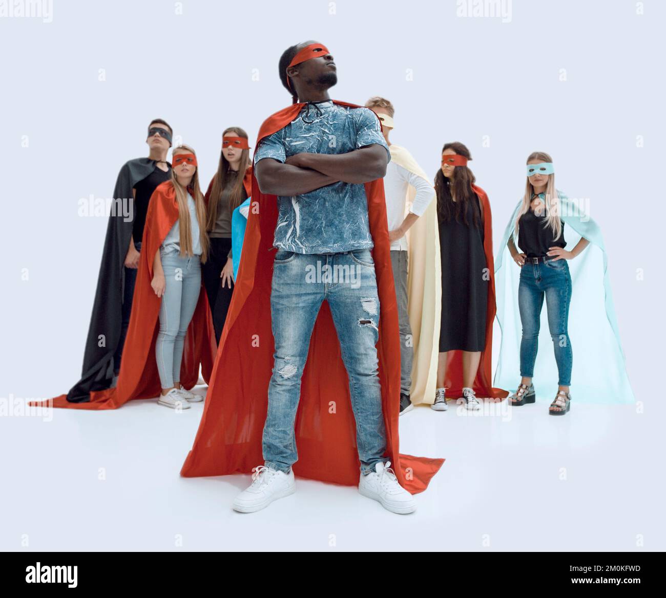 stylish guy in a superhero Cape standing in front of his team Stock ...