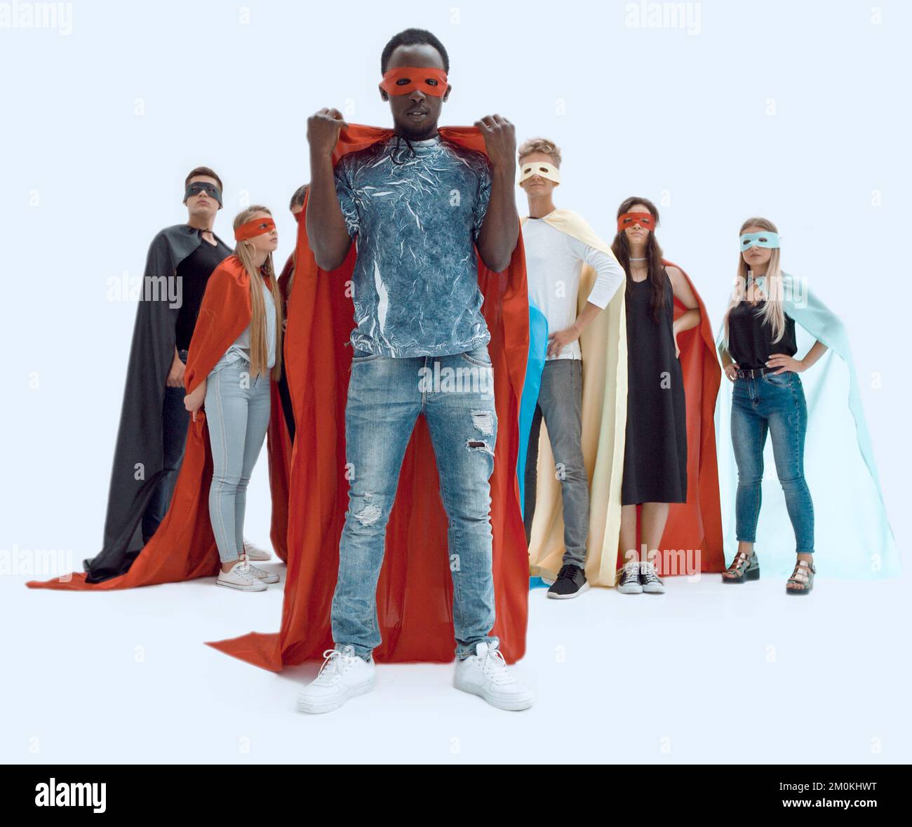 stylish guy in a superhero Cape standing in front of his team Stock ...