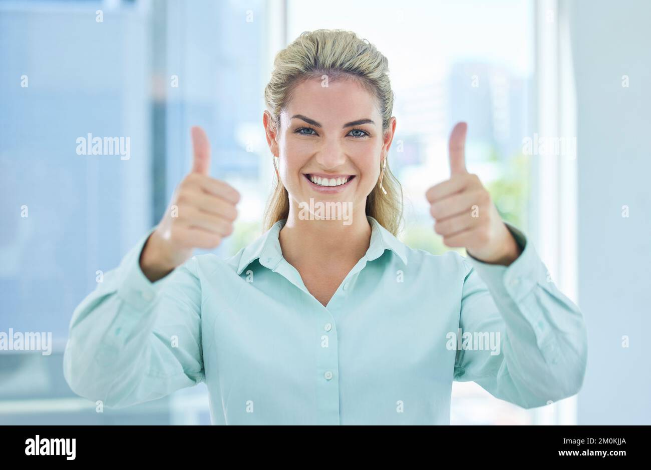 Business woman, face or thumbs up in success, motivation or winner ...