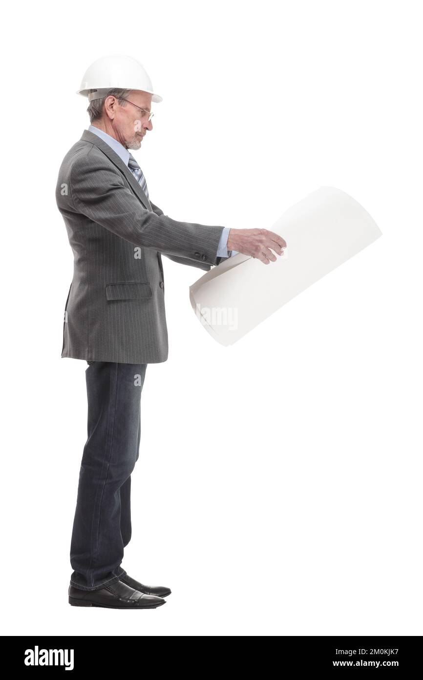 Front view of a male architect while carrying blueprints and walking at ...