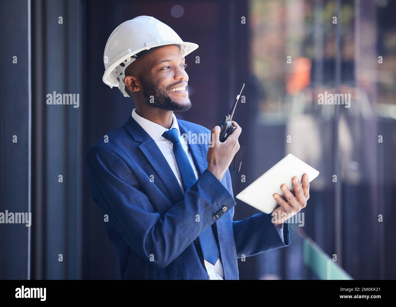 Businessman, tablet and talking on walkie talkie architecture design ...