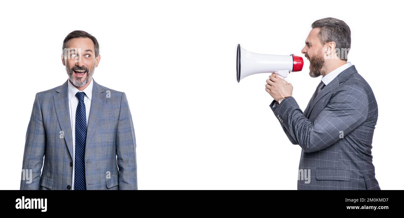 businessmen ignore shouting in megaphone, copy space. two businessmen ...