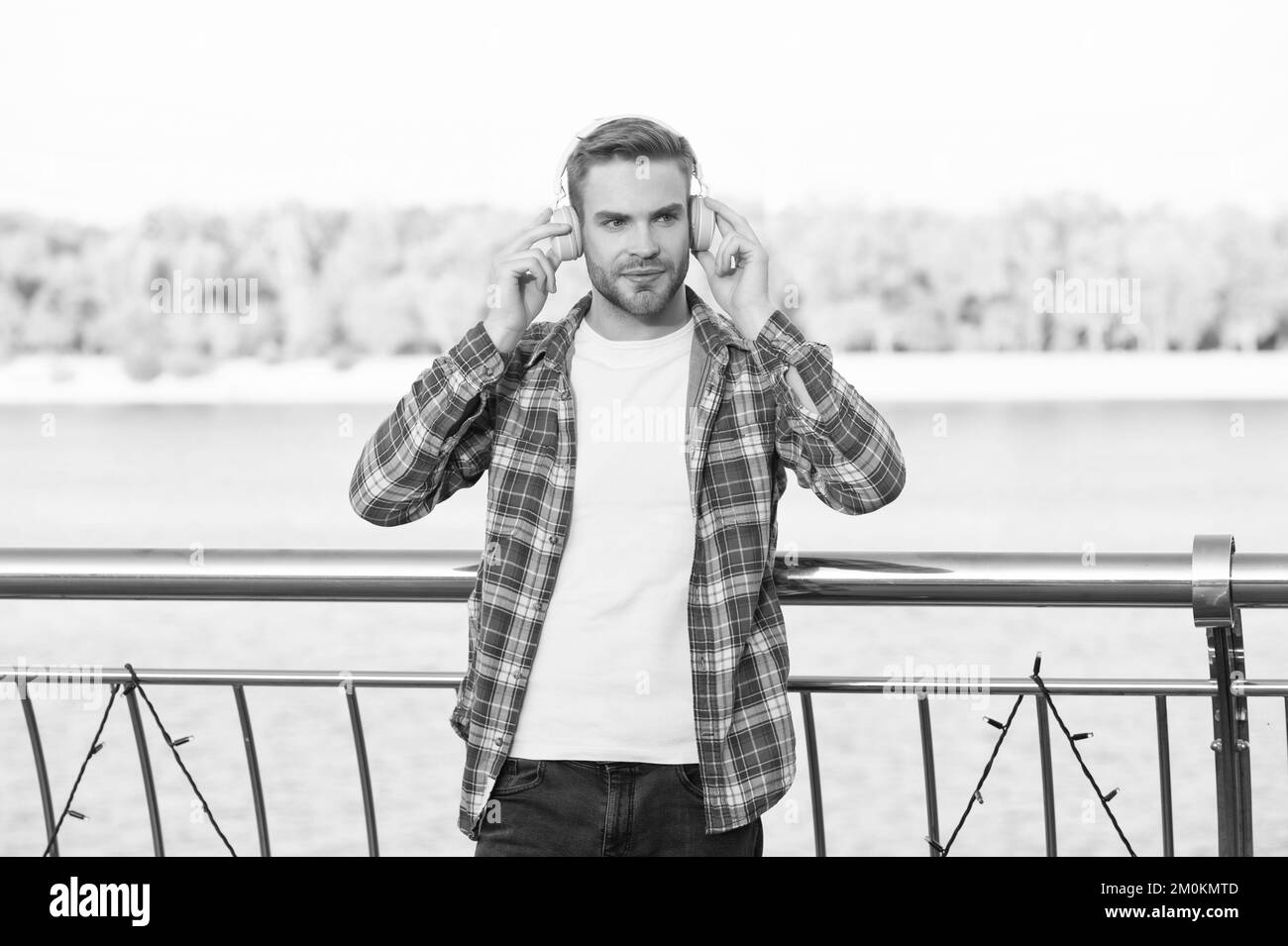 Young unshaven guy listen Black and White Stock Photos & Images - Alamy