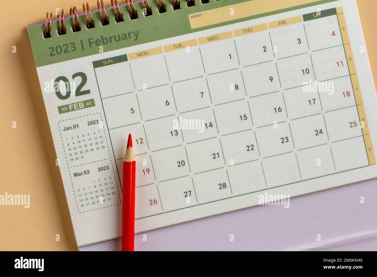 Desktop calendar for February 2023 on a light background Stock Photo ...