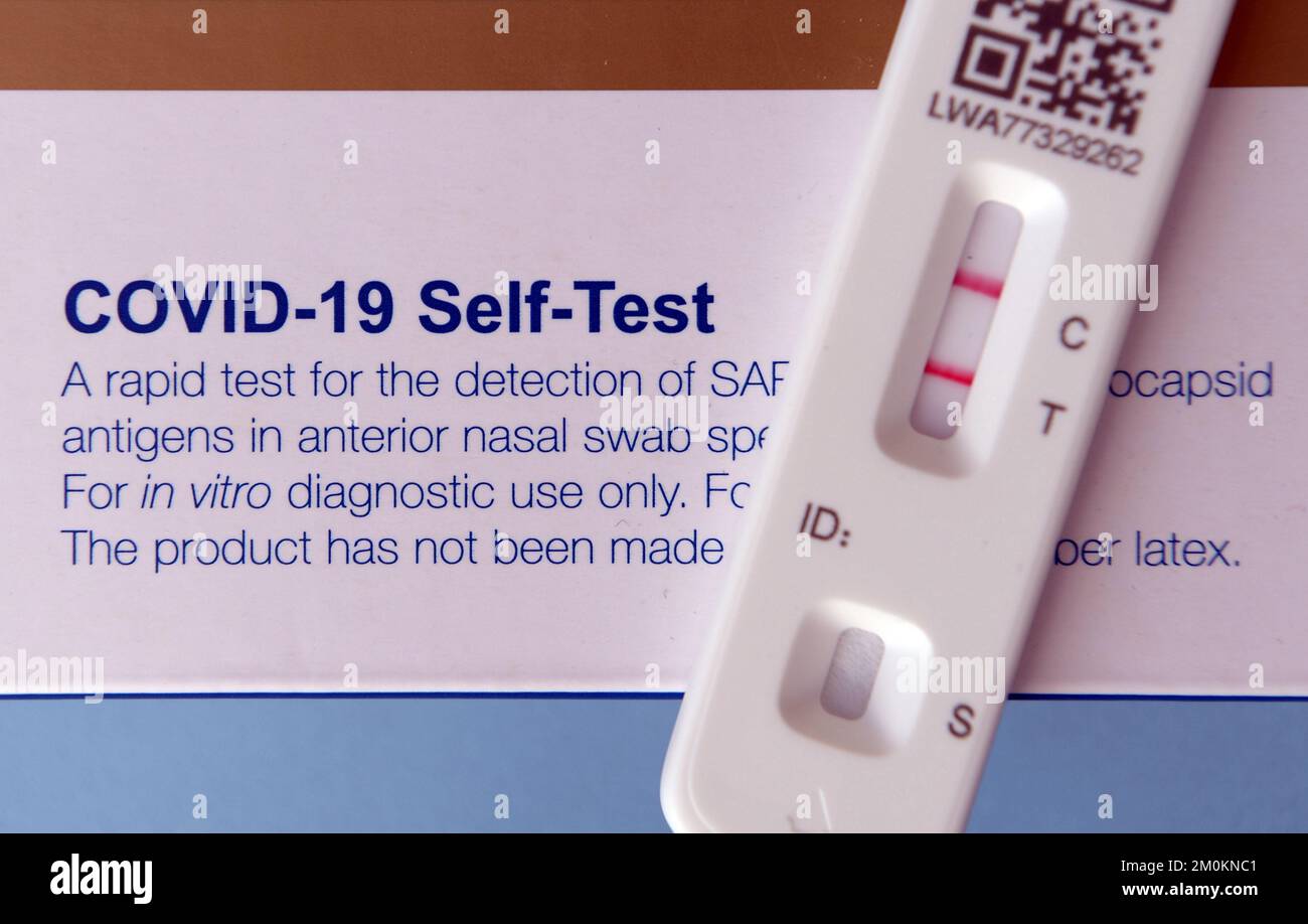 Positive Covid-19 lateral flow test Stock Photo - Alamy