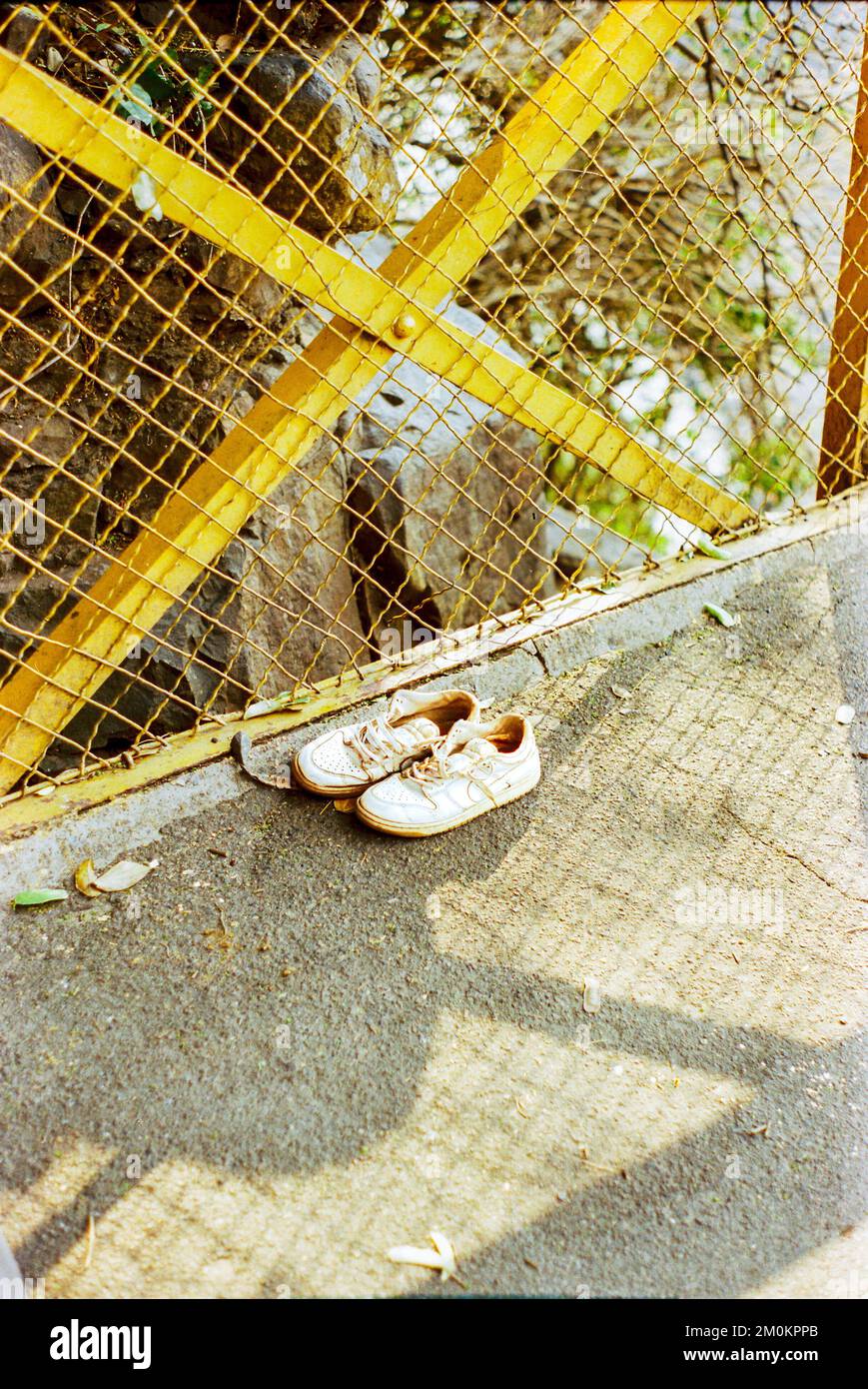 Discarded shoes hi-res stock photography and images - Alamy