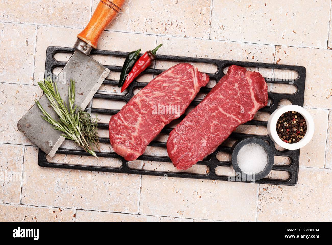 Prime marbled beef steaks. Raw striploin steak. Flat lay Stock Photo ...