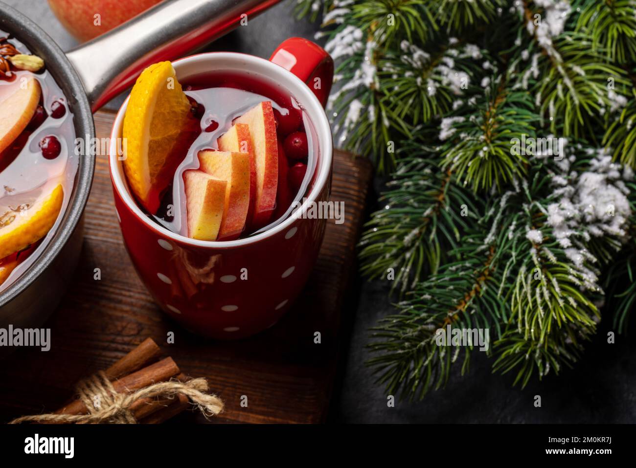 Hot mulled wine with fruits and spices Stock Photo - Alamy