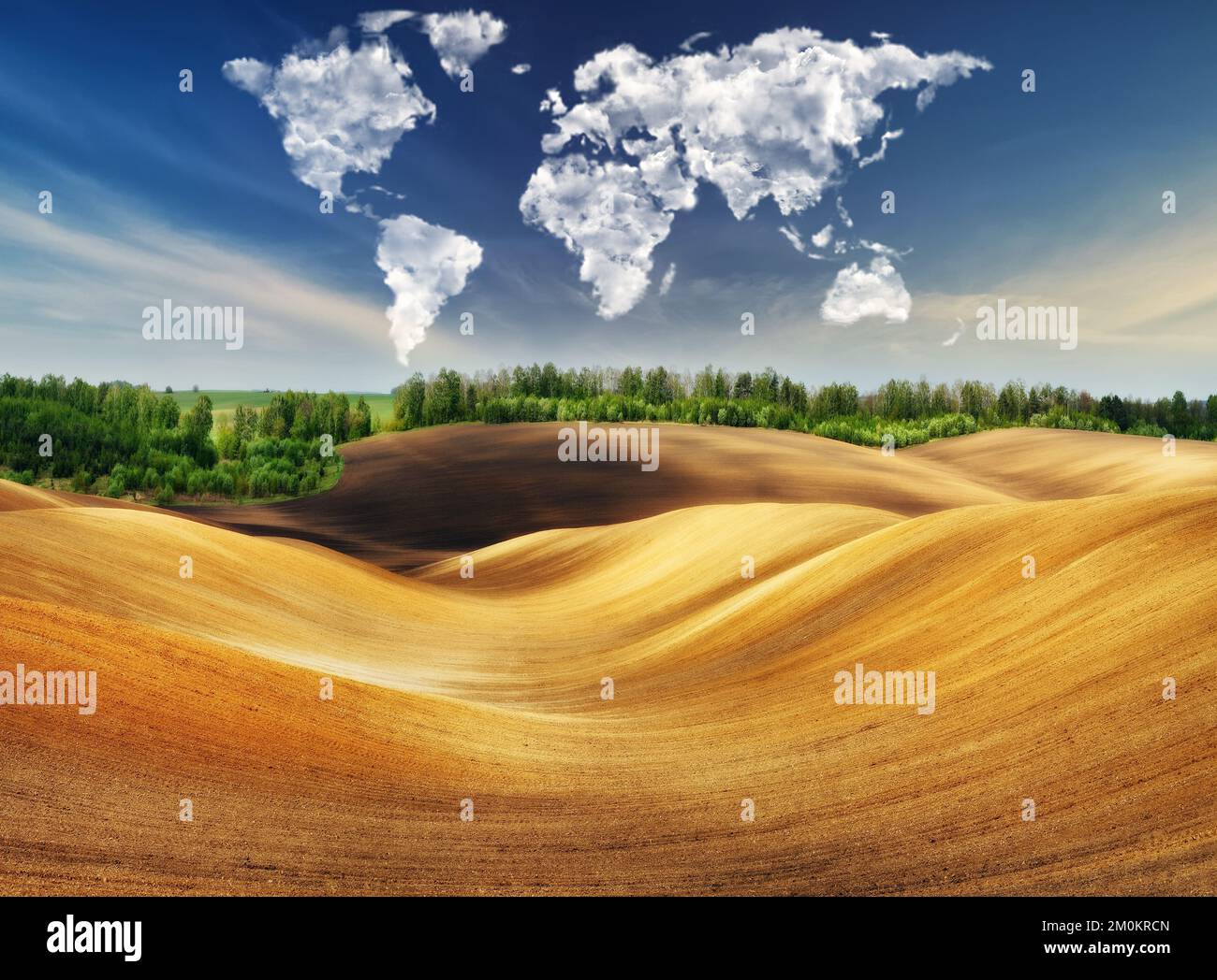 clouds in the form of a map of the world over the field. Travel and ...