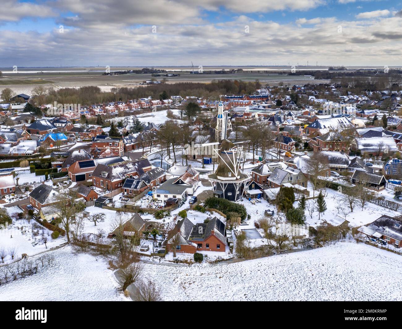 Aerial View over Village of Spijk in Winter Landscape with Snow in the ...