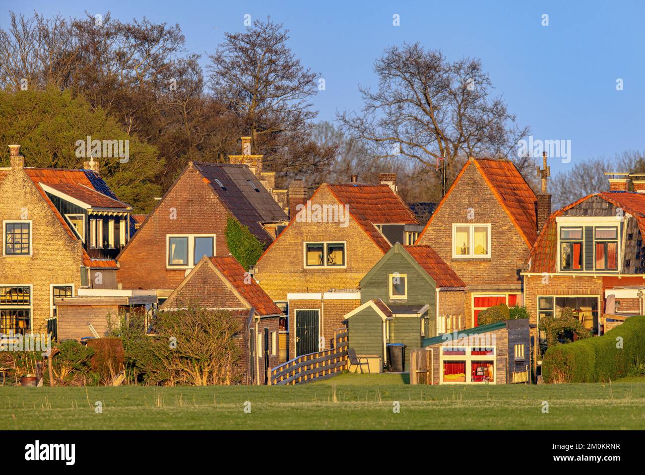 Detail of village with historic dutch buildings in the sun. Workum ...