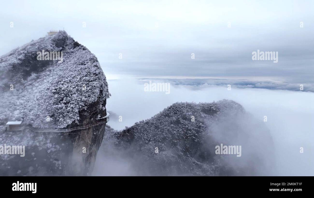Aerial photo shows the snow scenery of Batai Mountains in Wanyuan City ...