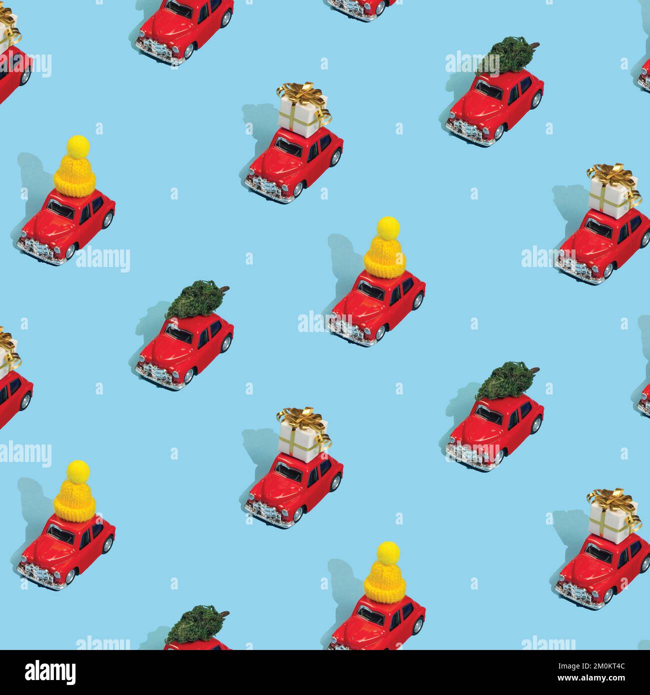 Christmas pattern made with New Year red cars with gifts, pine trees ...