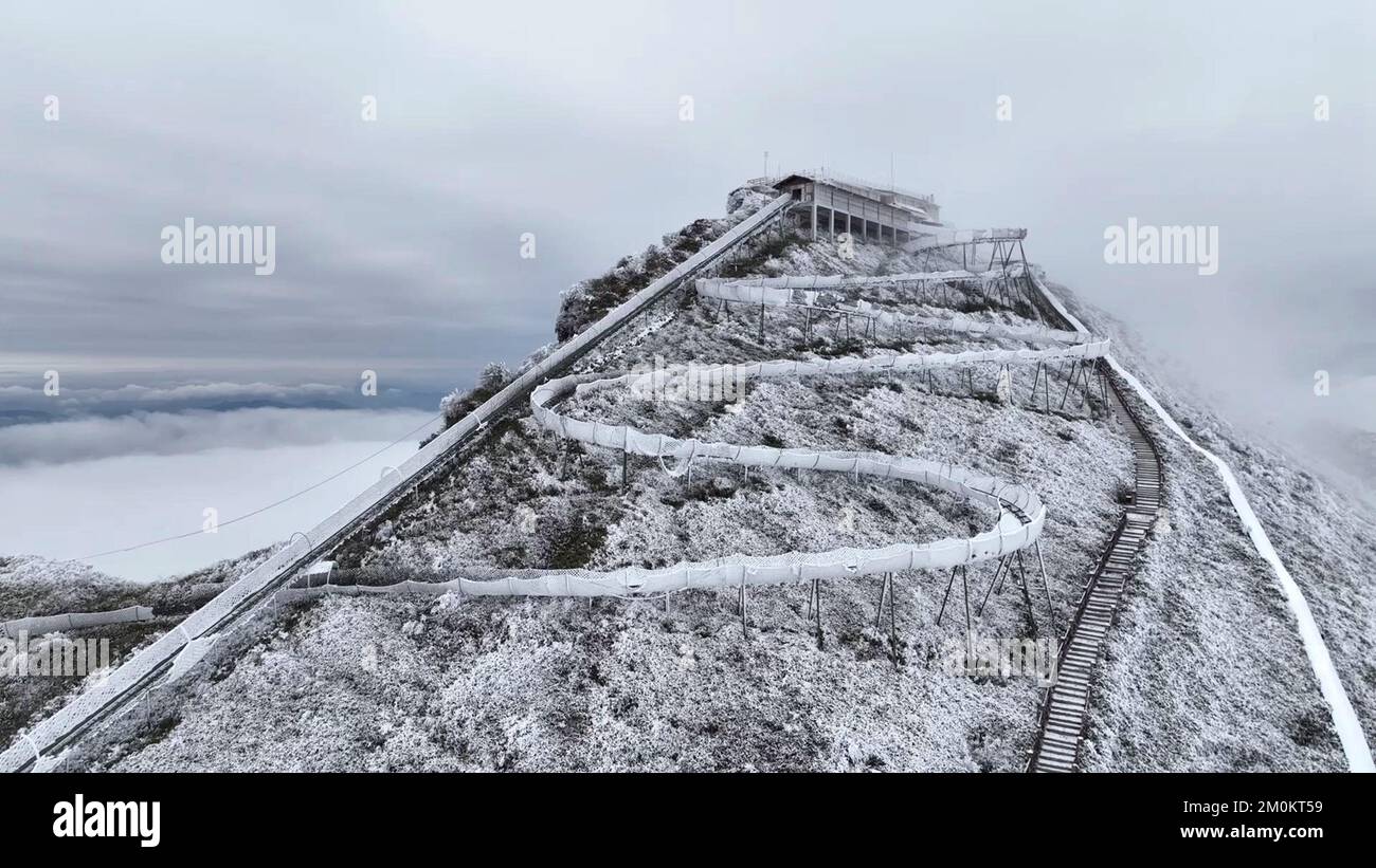 Aerial photo shows the snow scenery of Batai Mountains in Wanyuan City ...