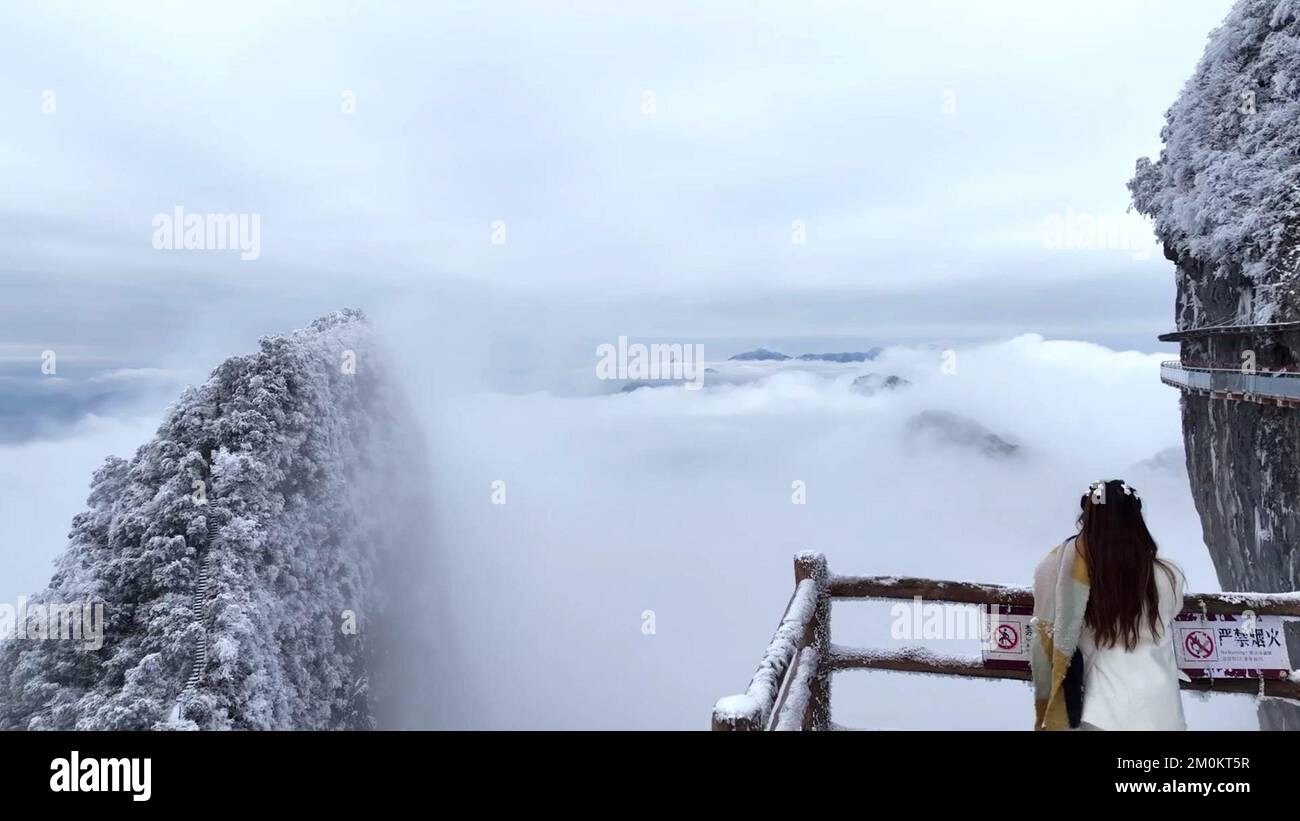 Aerial photo shows the snow scenery of Batai Mountains in Wanyuan City ...