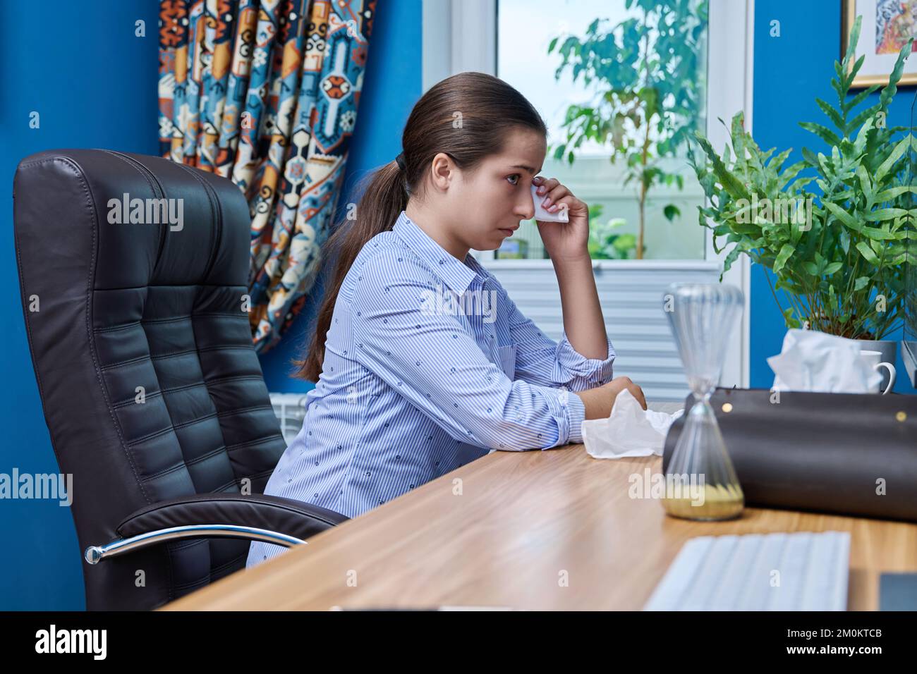 Teenage upset girl crying in front of computer screen Stock Photo - Alamy