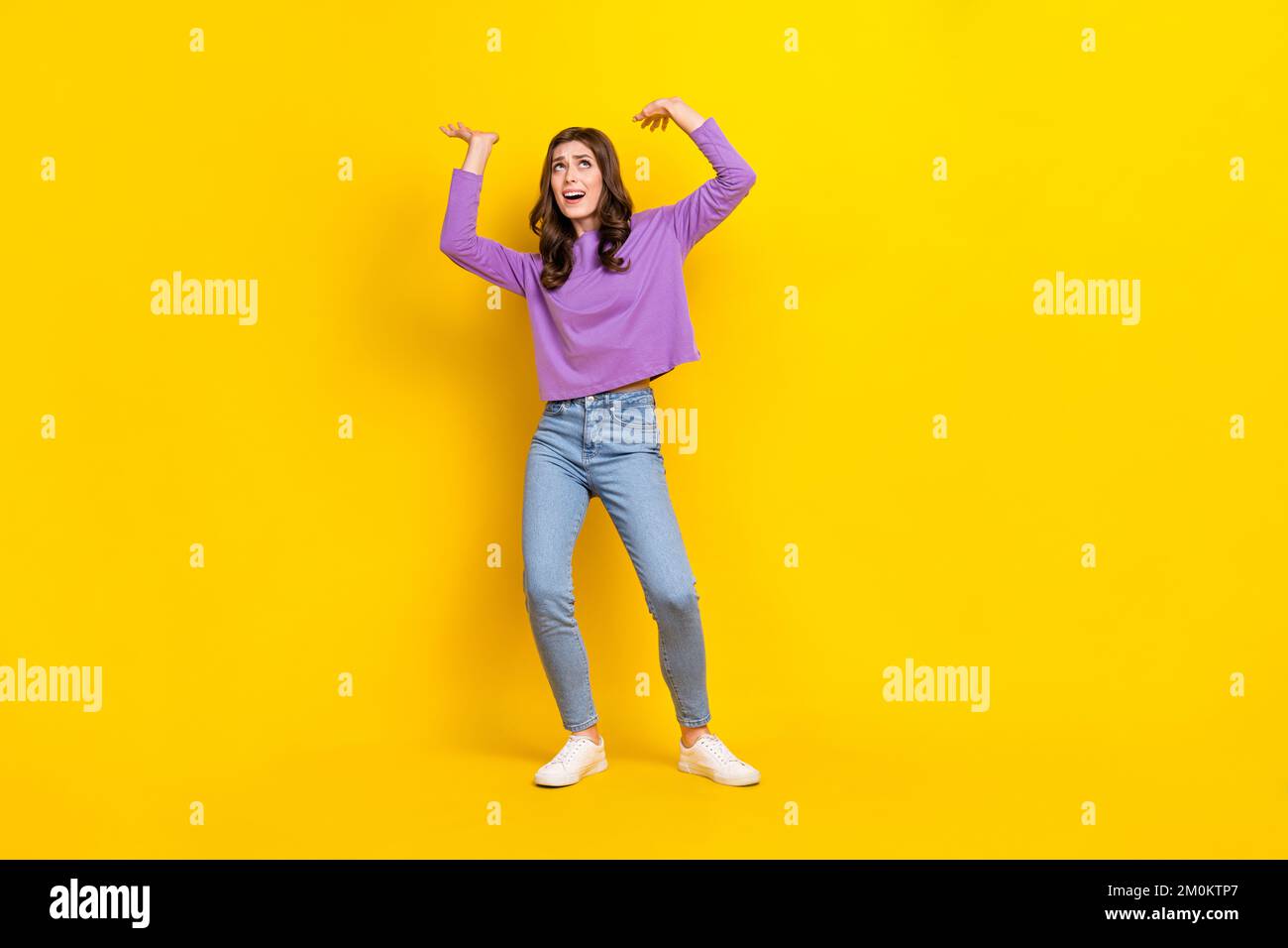 Full size portrait of impressed hardworking girl arms hold heavy empty ...