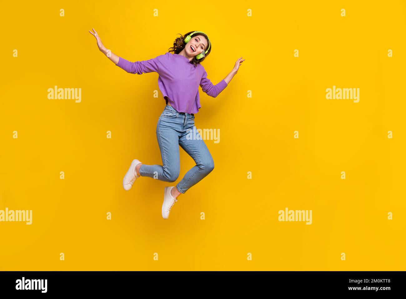 Full size portrait of cheerful delighted girl enjoy favorite music ...