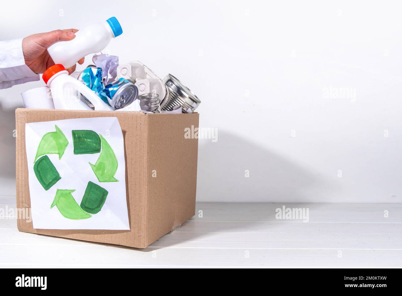 Garbage sorting, waste recycling concept. Box with recycling materials ...