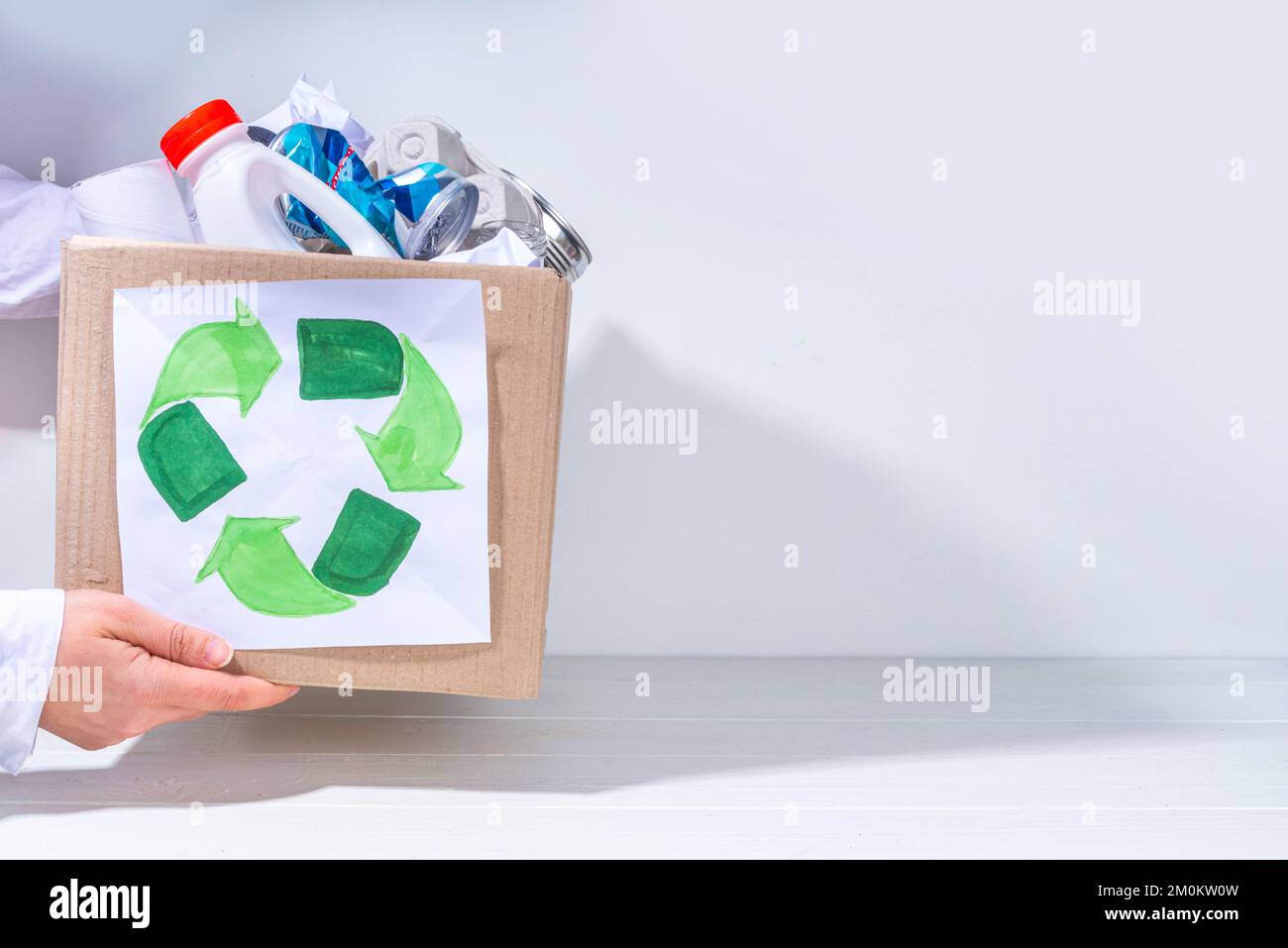 Garbage sorting, waste recycling concept. Box with recycling materials ...