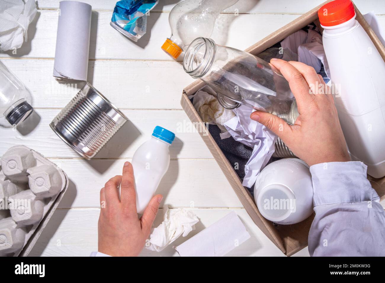 Garbage sorting, waste recycling concept. Box with recycling materials ...