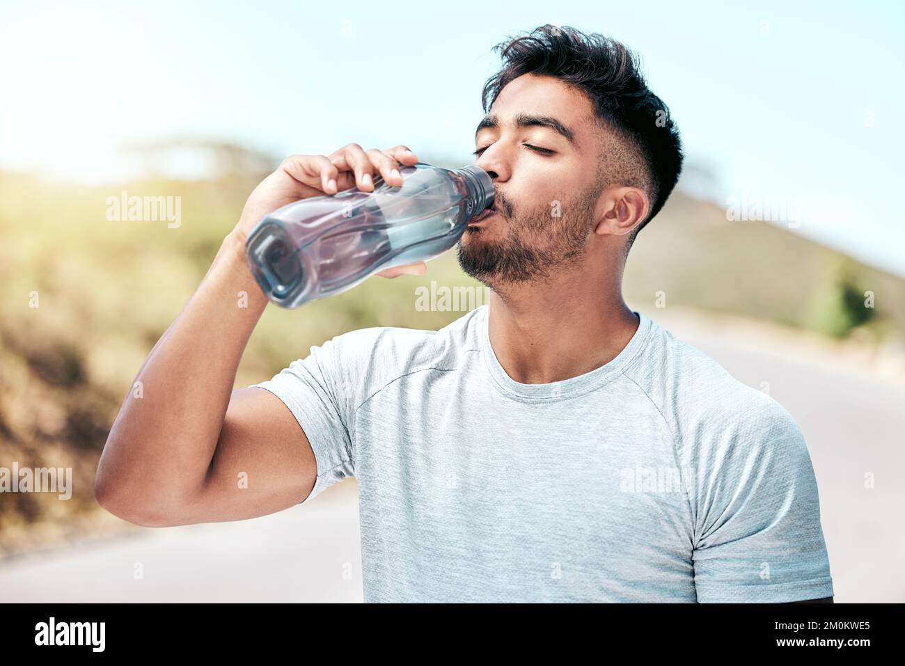 Man Bottled Water While Exercising