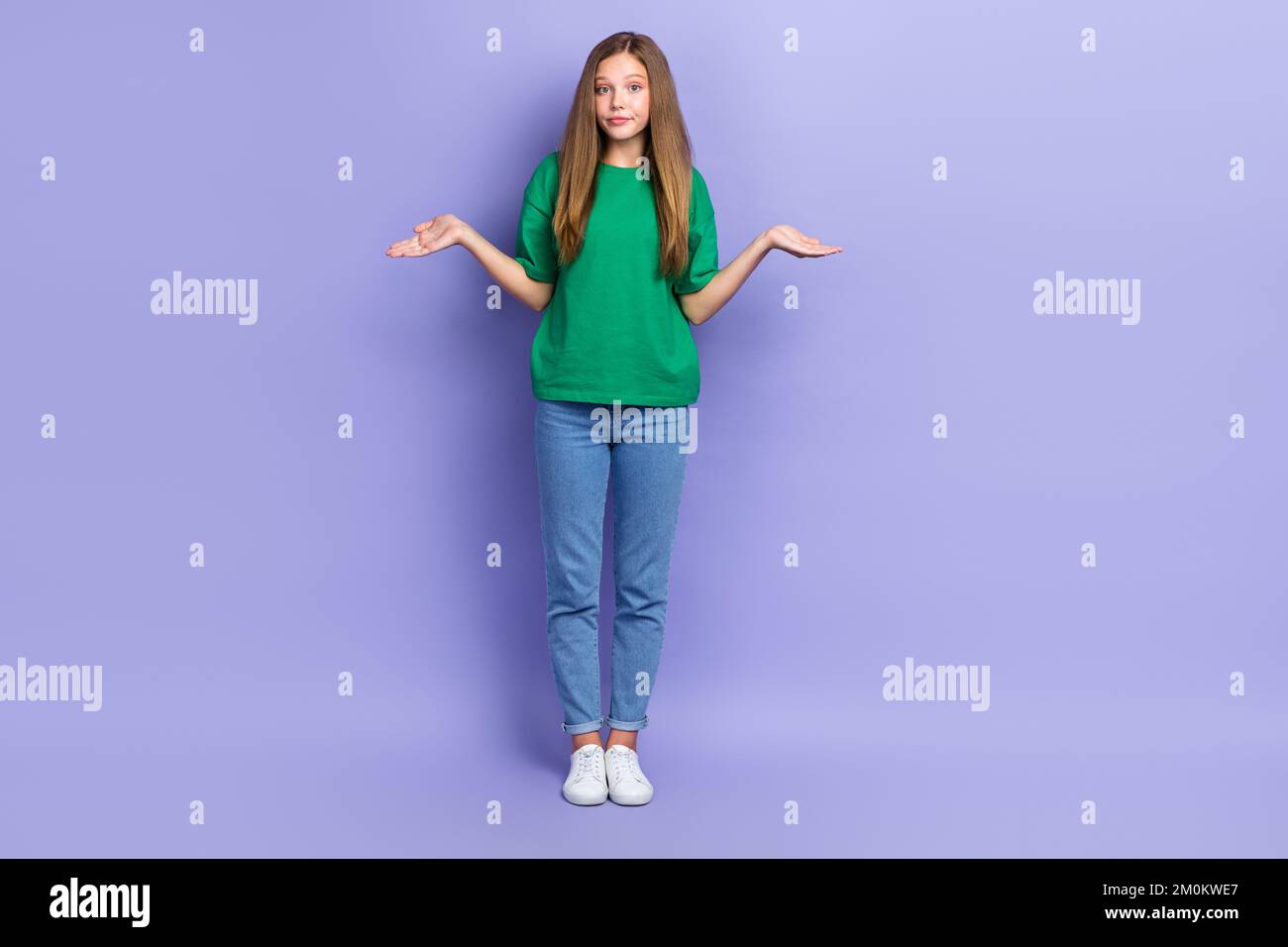 Full length photo of doubtful unsure girl dressed green t-shirt ...