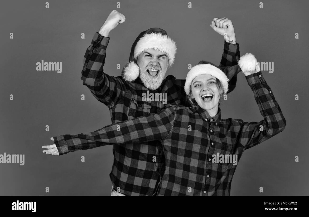 Good mood. Couple goals. Santa Claus style. Christmas time. Man and ...