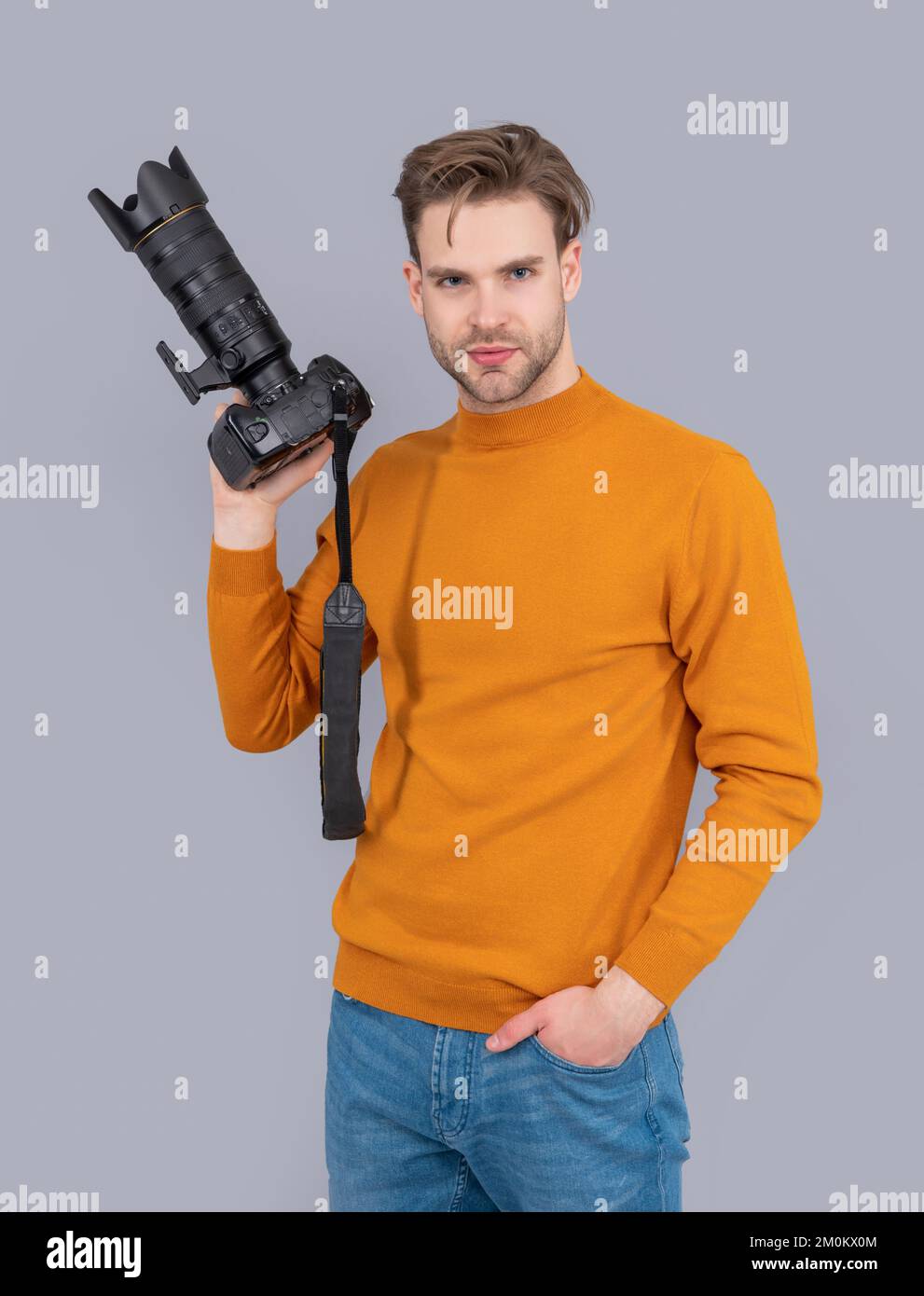 man with photography camera in studio. photography man with photo ...