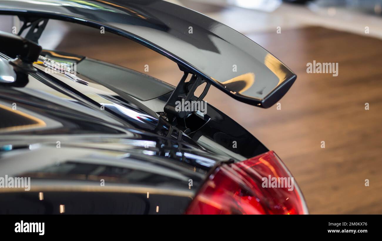 A closeup of the Porsche Cayman S rear wing active aero system Stock ...