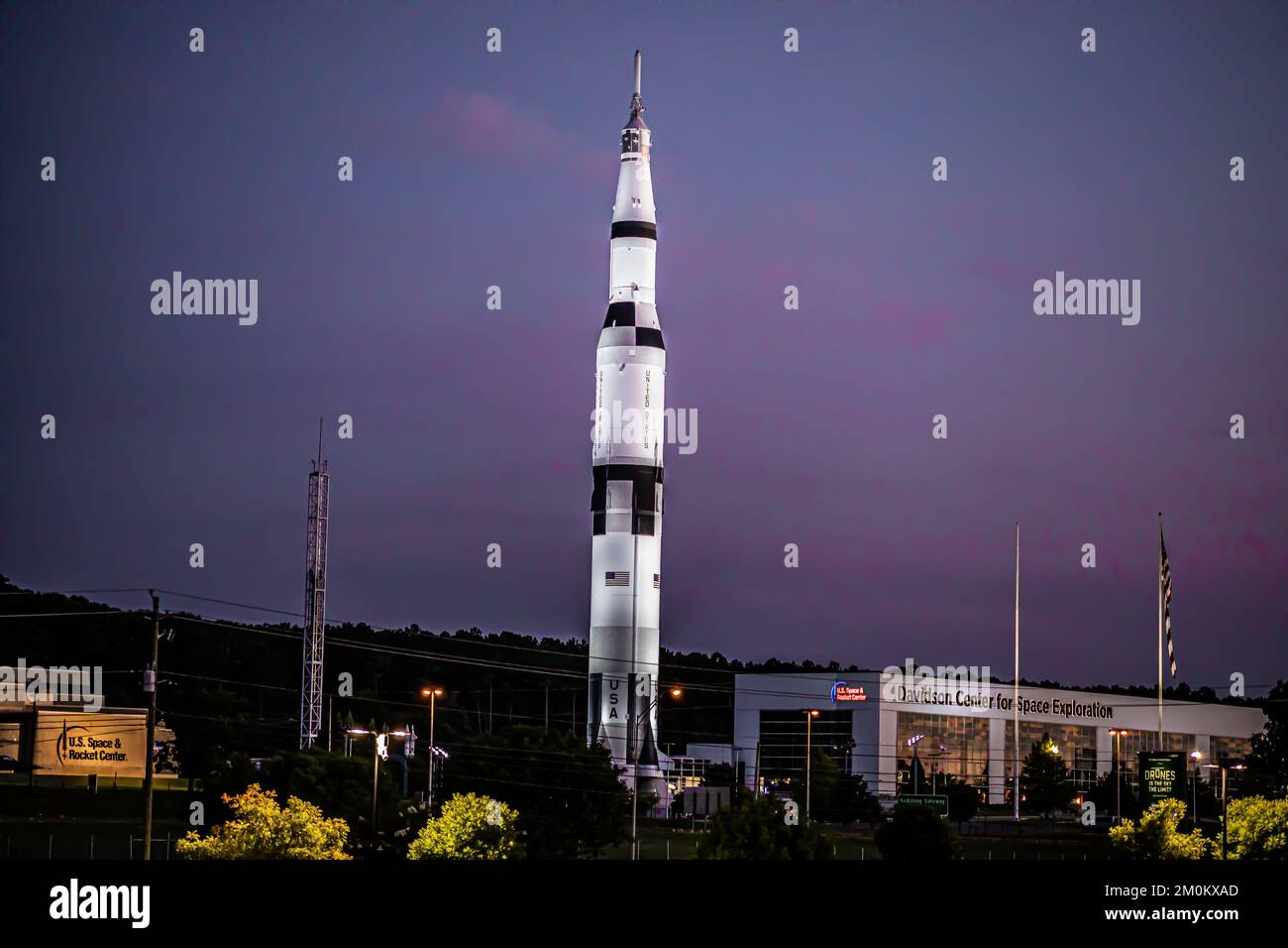 The Saturn V NASA rocket against a sunset sky at the space and rocket center in Huntsville ...