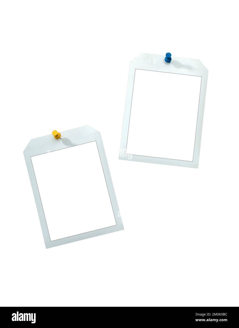 Instant frames hang on wall with colored pins. Isolated on White with ...