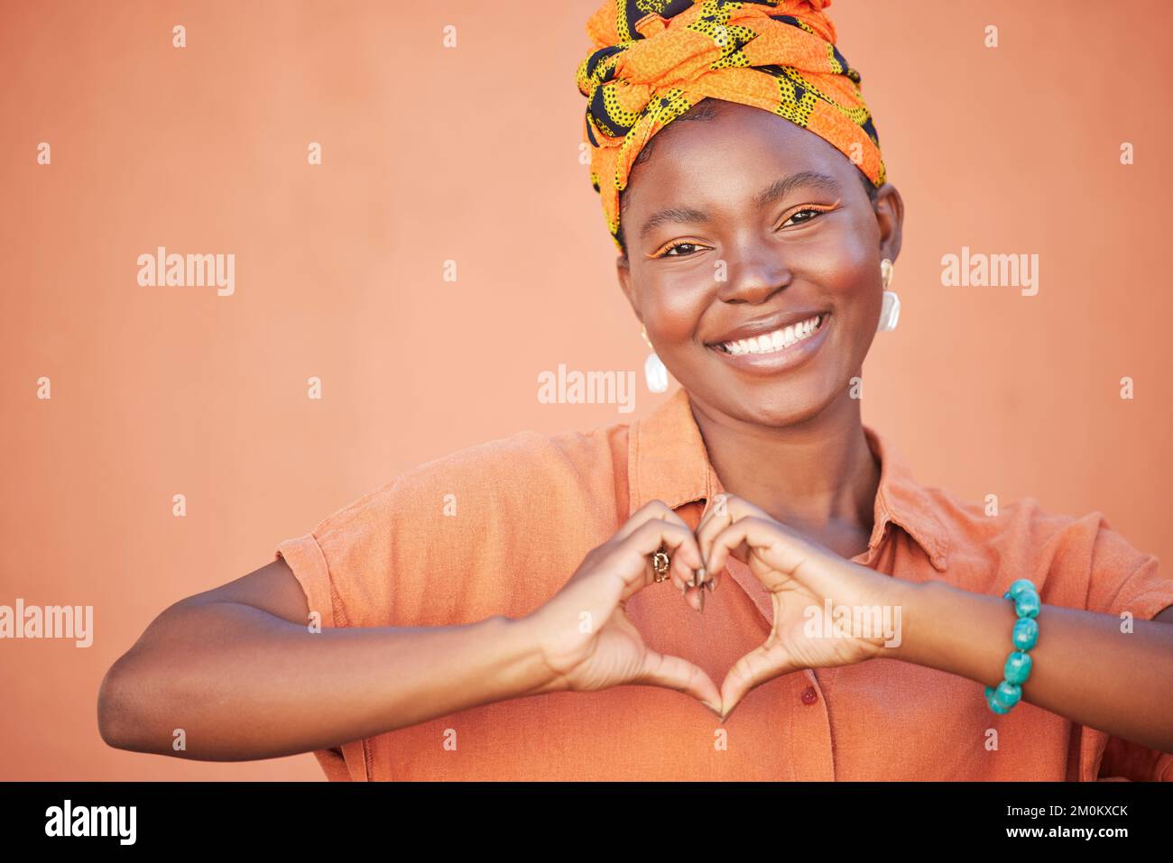 Portrait of black woman, heart hands and emoji for love, care and ...