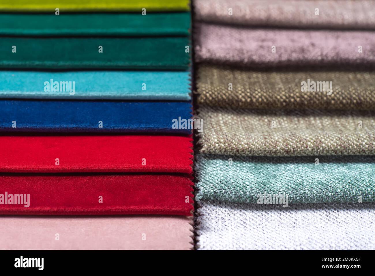 Bright collection of colorful textile samples. Fabric swatches, set in ...