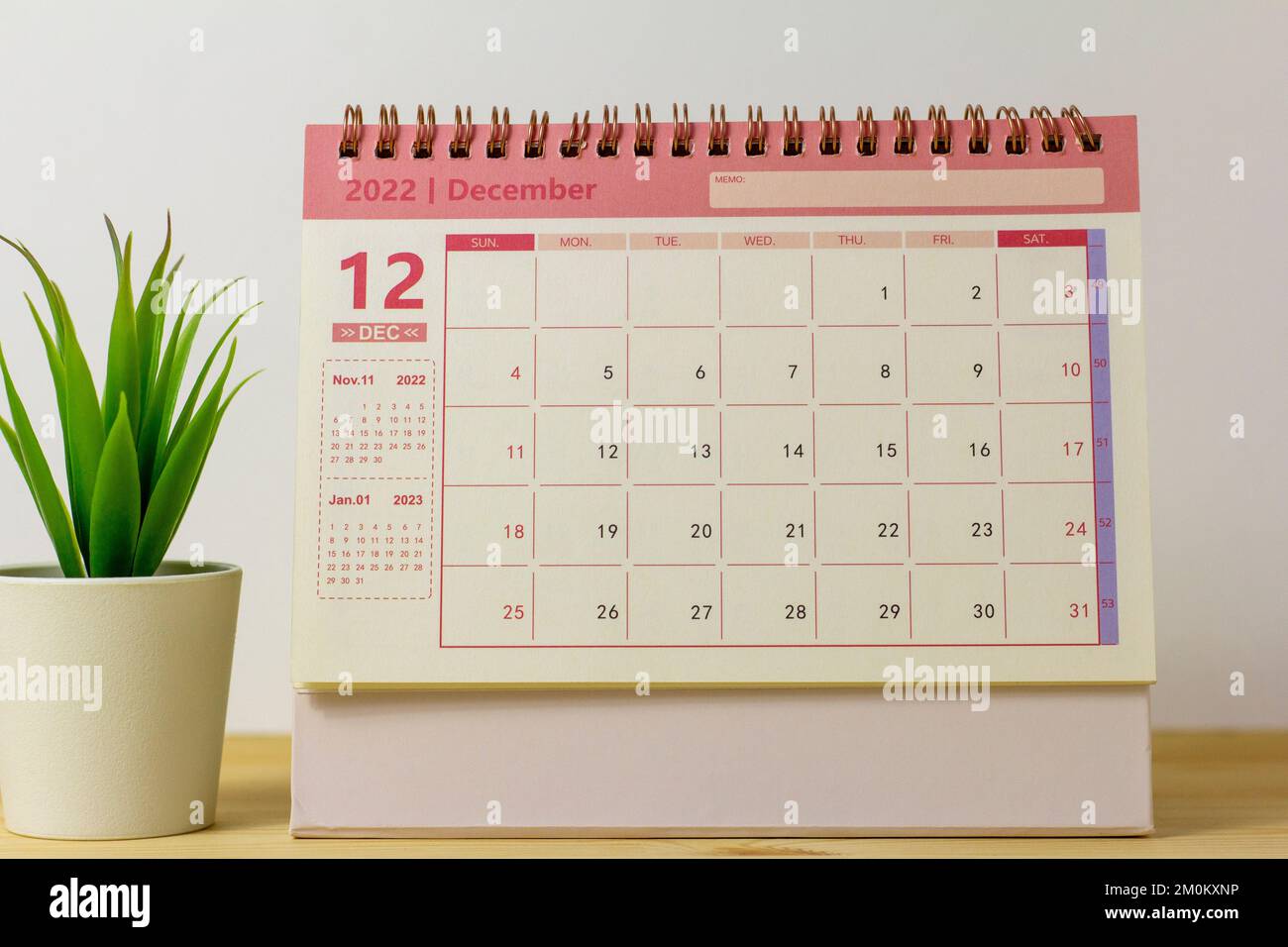December calendar 2022 on the background of a wooden table.Planning for ...