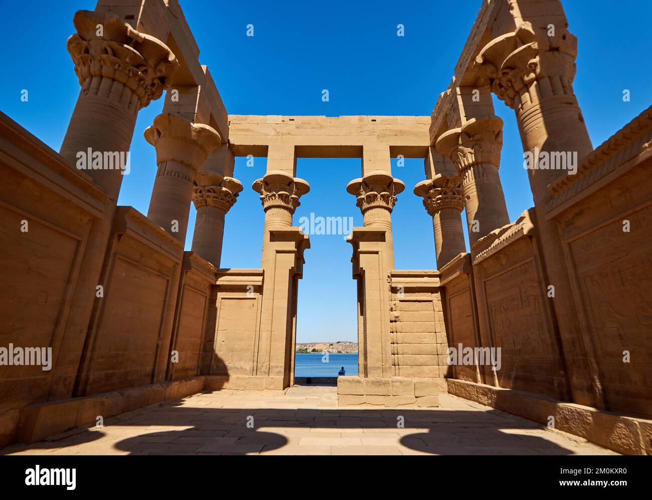 A scenic shot of the Philae temple complex against the blue sky in ...
