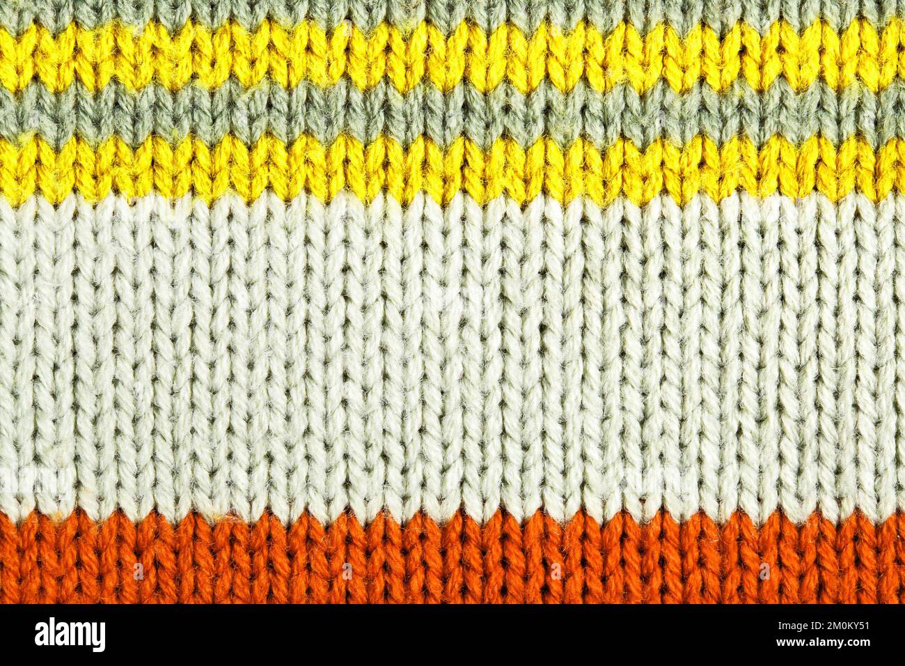 Knitted wool fabric material background Stock Photo - Alamy