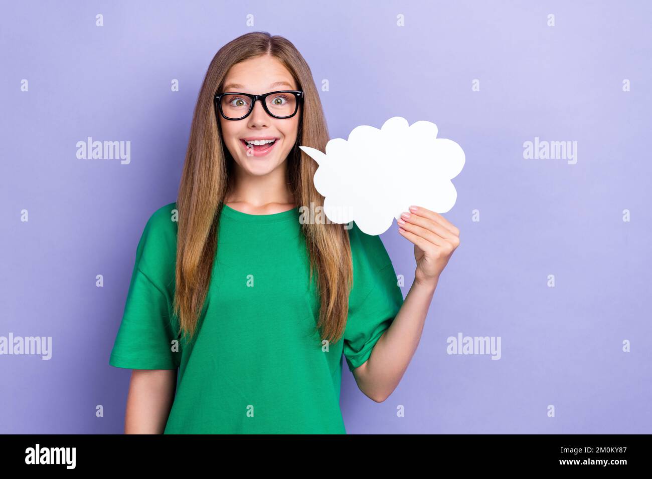 Photo of positive pretty pupil learner wear green clothes hold white ...