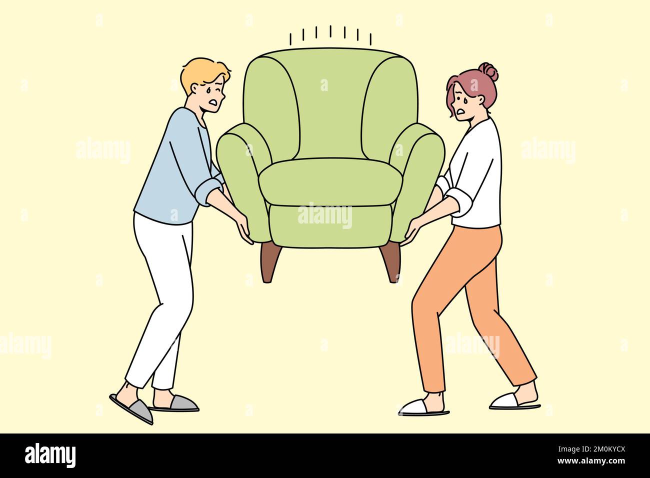 Man, woman install heavy armchair after moving to new apartment. Family ...