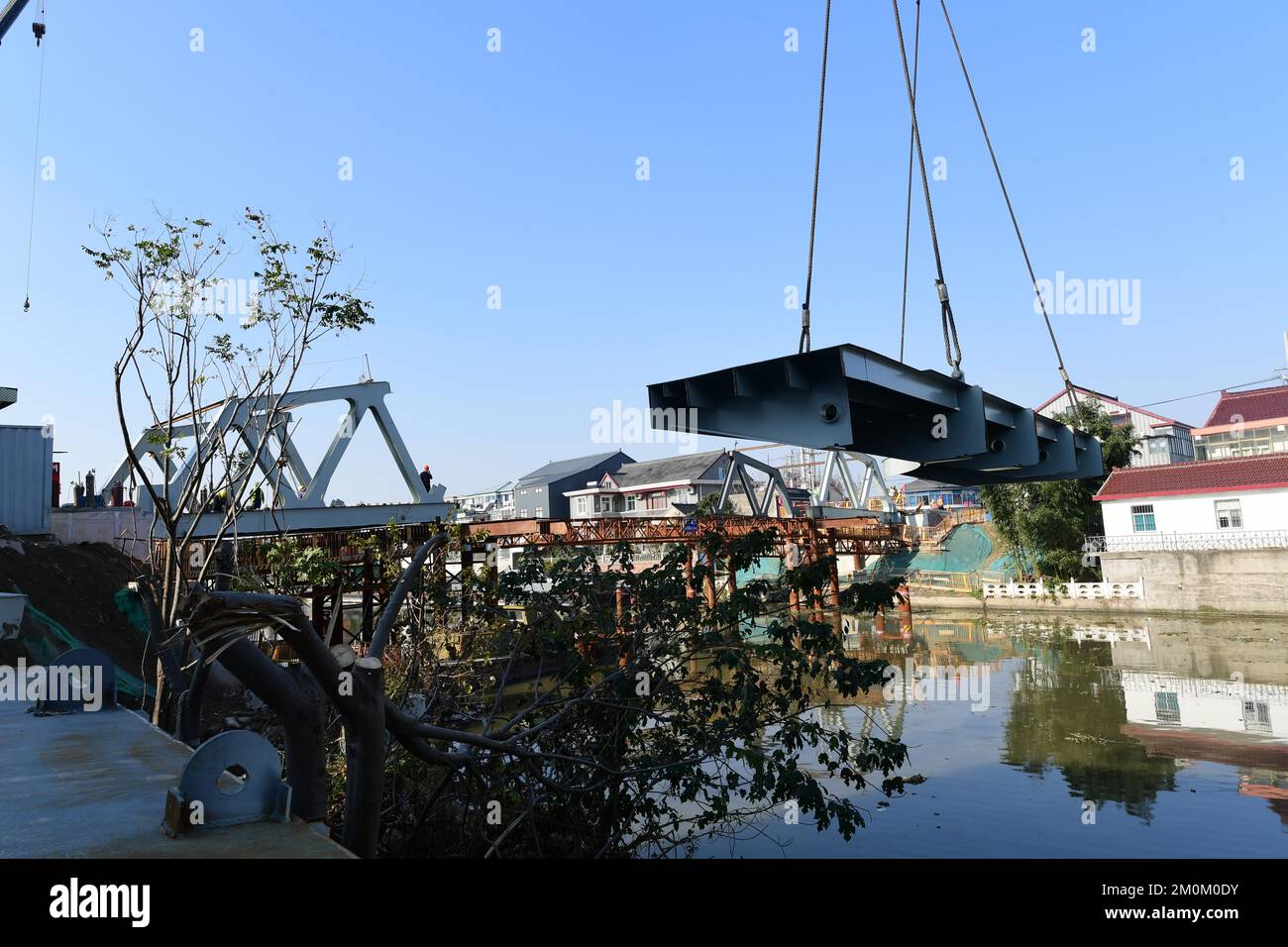 Aerial photo shows the reconstruction site of Dingsuo Bridge in Libao ...